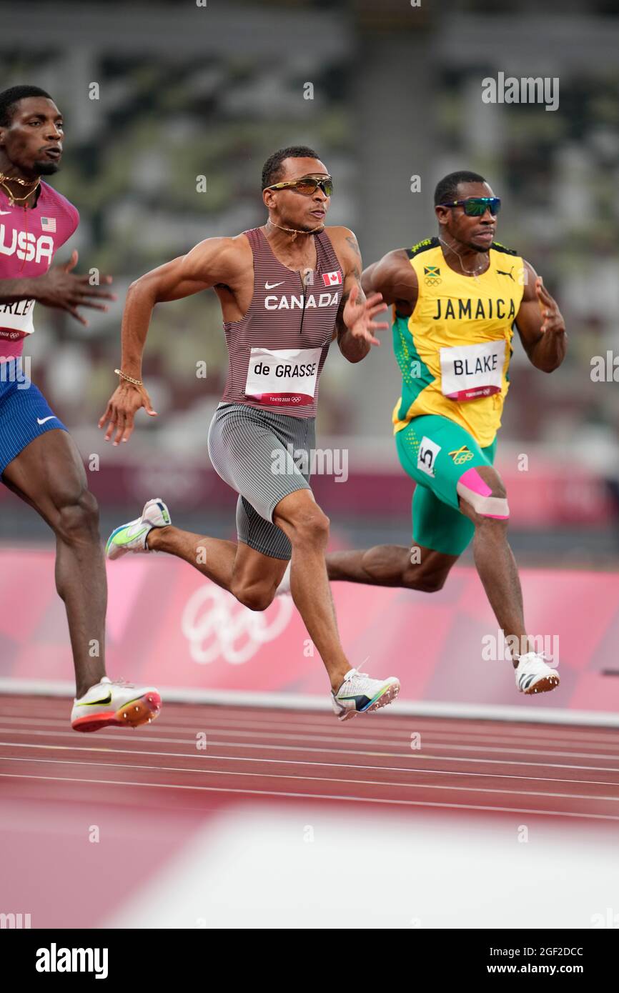 Andre De Grasse running the 100 meters at the 2020 Tokyo Olympics Stock ...