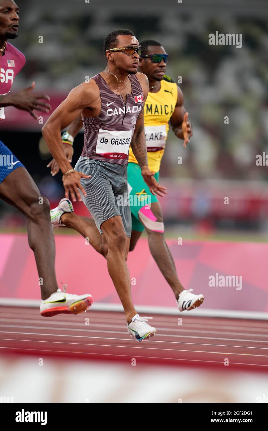 Andre De Grasse running the 100 meters at the 2020 Tokyo Olympics Stock ...