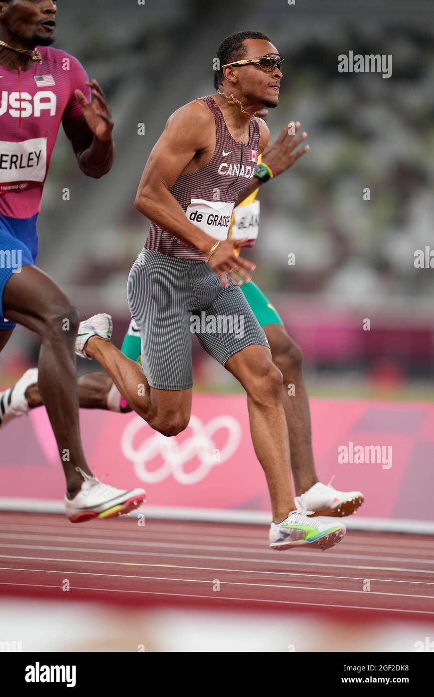 Andre De Grasse running the 100 meters at the 2020 Tokyo Olympics Stock ...