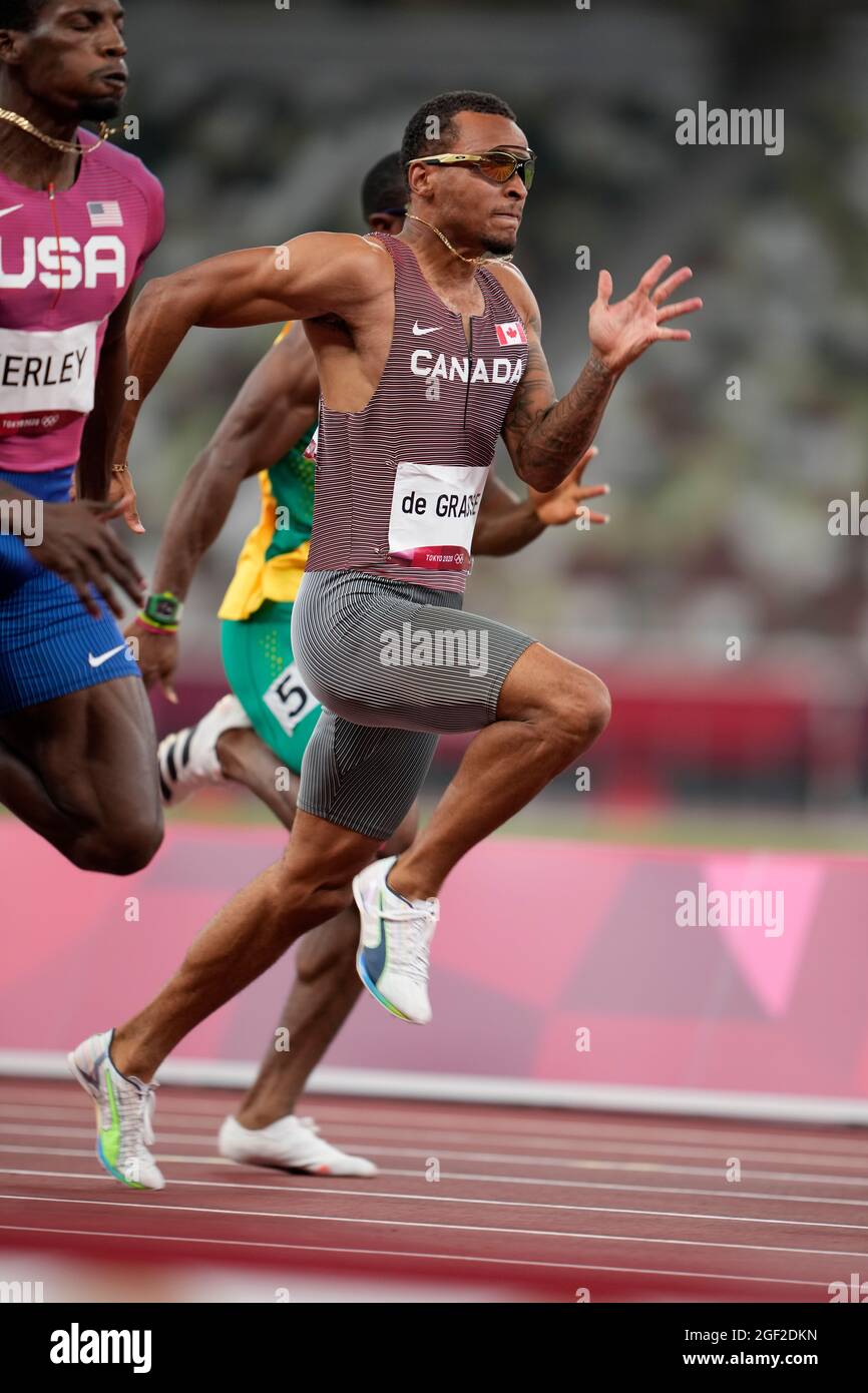 Andre De Grasse running the 100 meters at the 2020 Tokyo Olympics Stock ...
