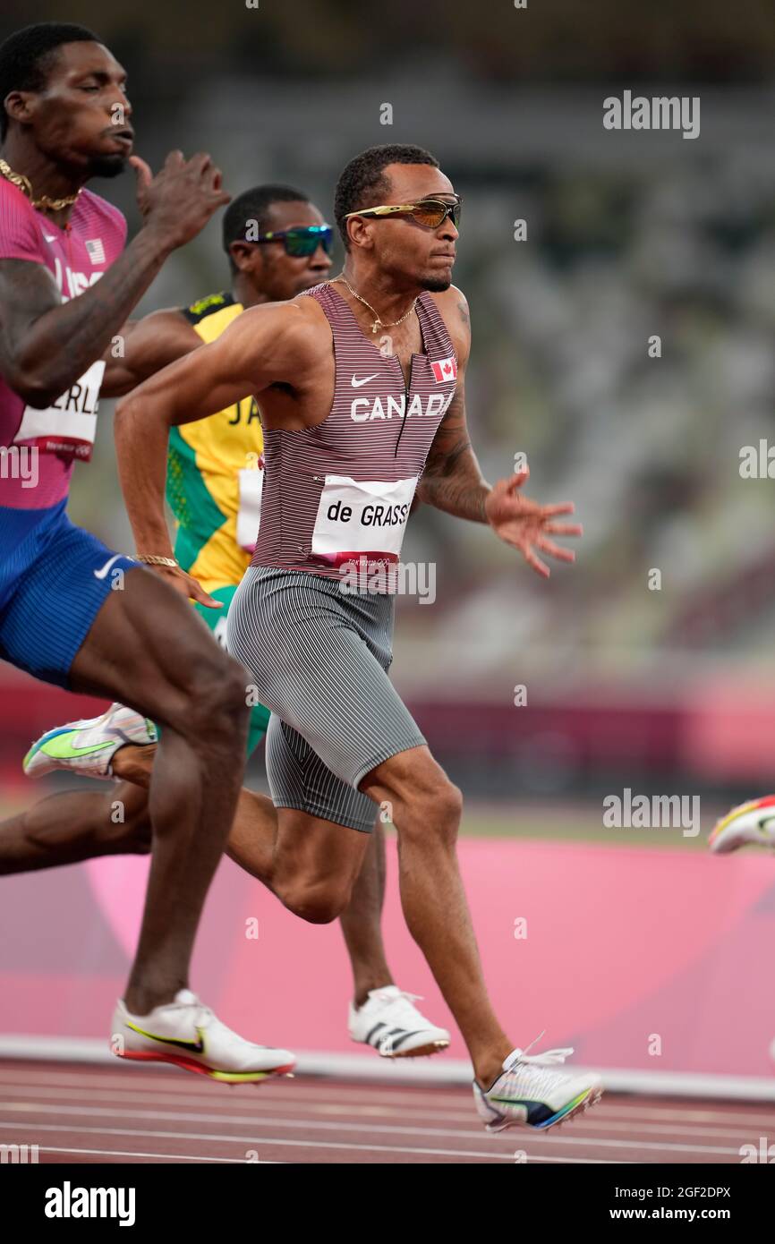Andre De Grasse running the 100 meters at the 2020 Tokyo Olympics Stock ...