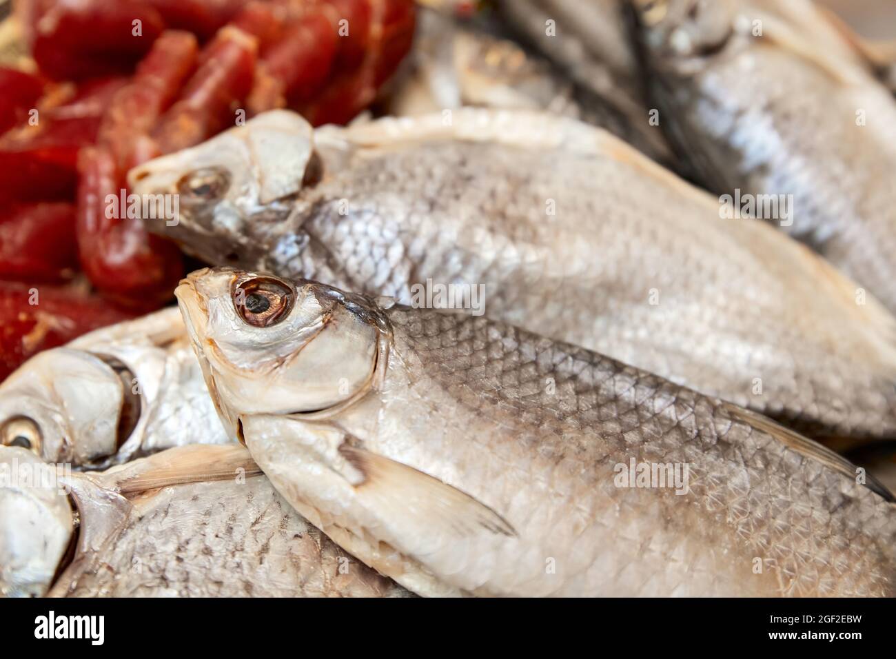 Many dried fish and fish roe. Close-up, selective focus Stock Photo - Alamy