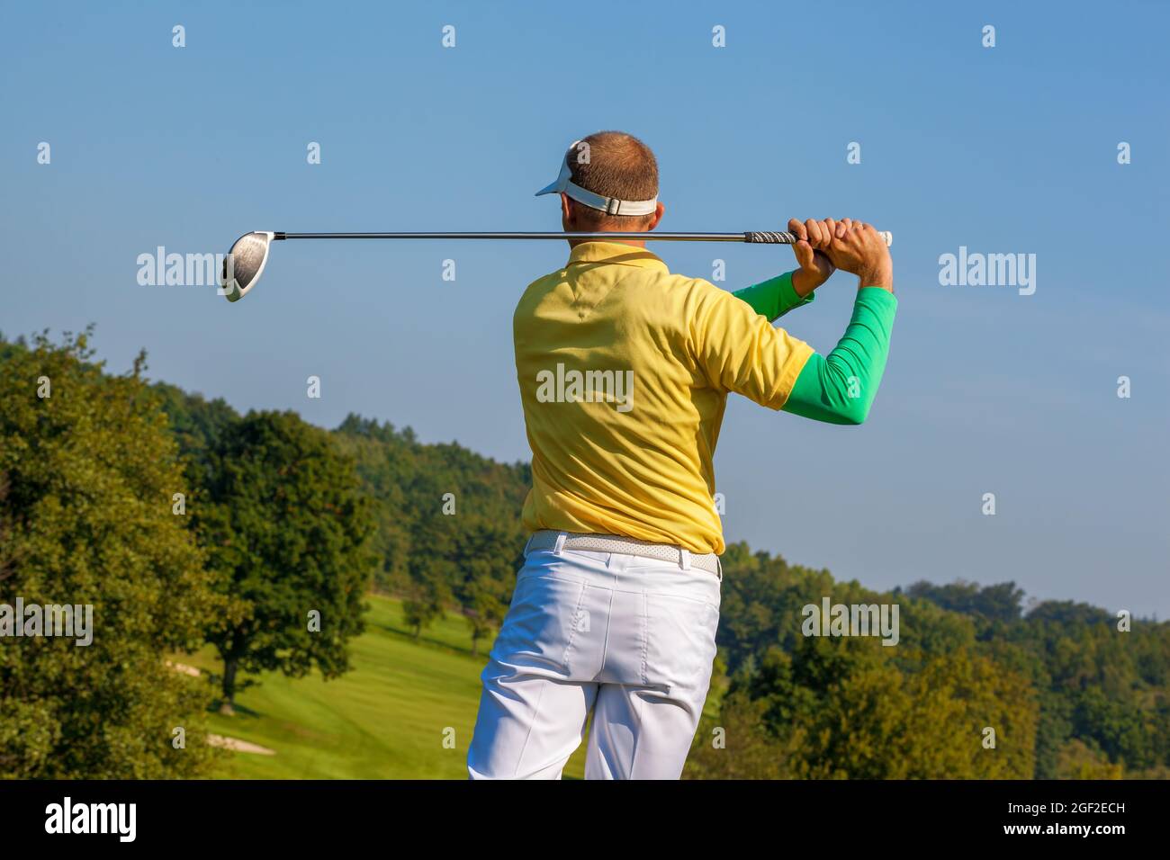 Boy playing golf red ball hi-res stock photography and images - Alamy