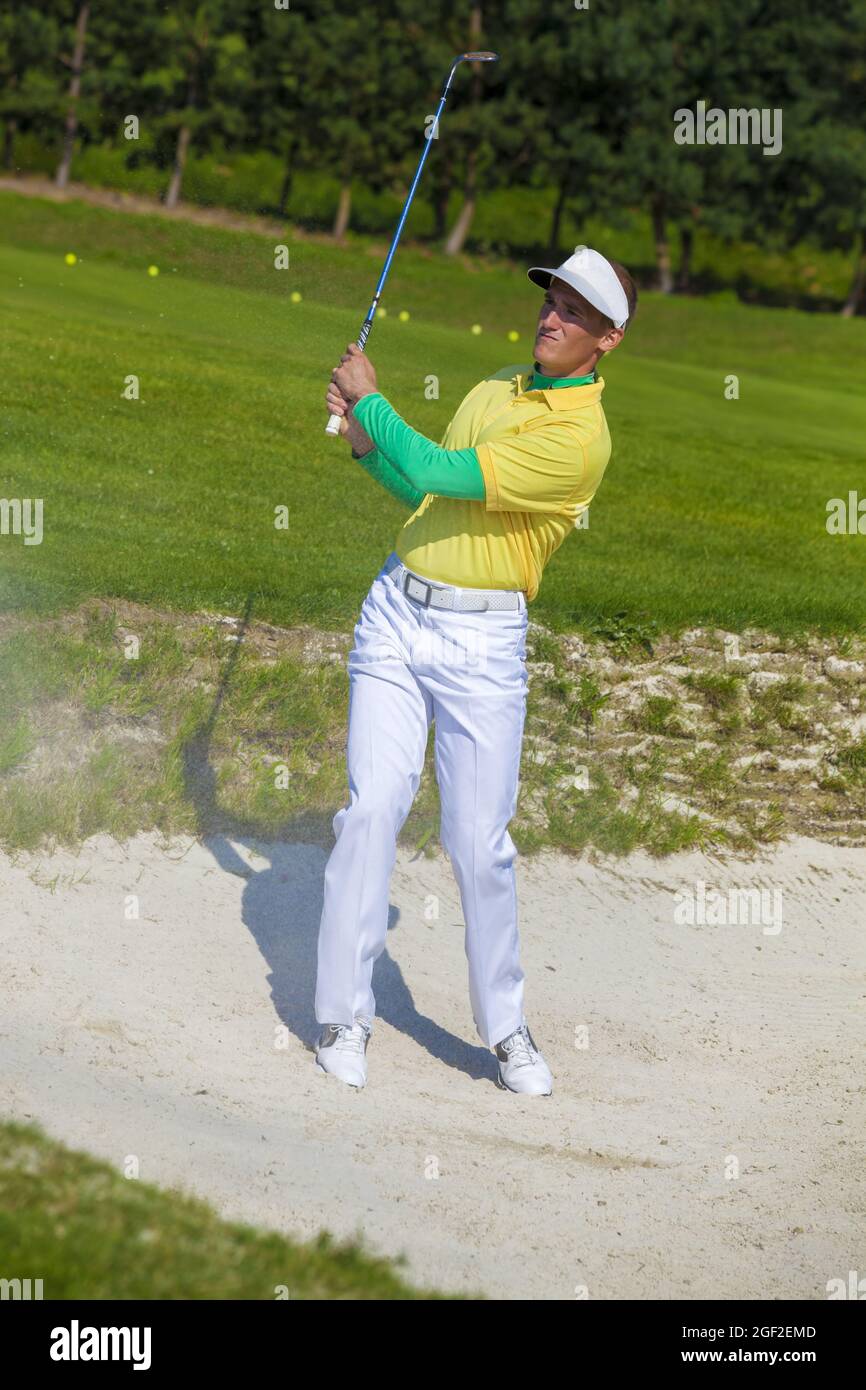 Man playing golf Stock Photo - Alamy