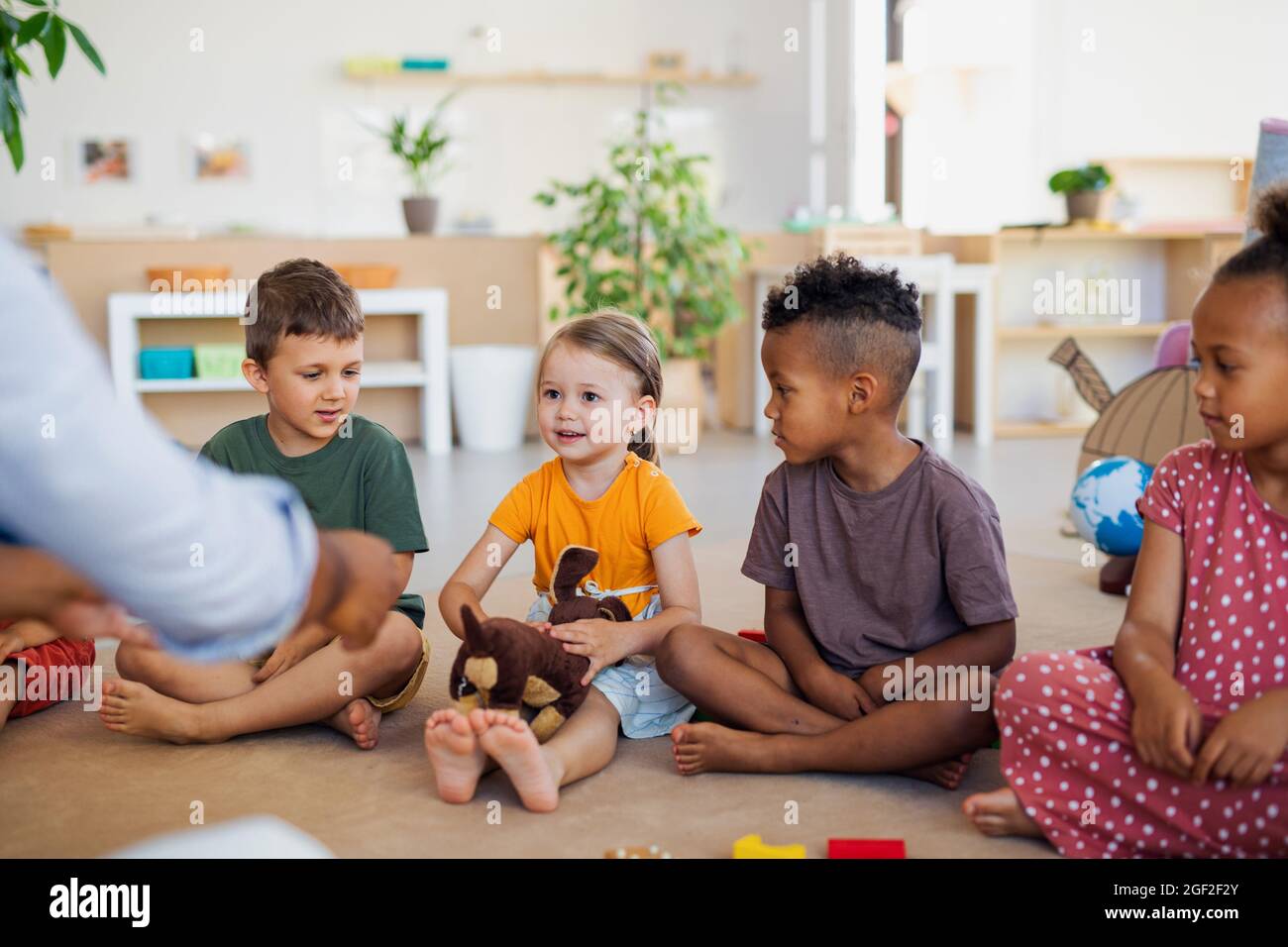 Kids Sitting On Floor
