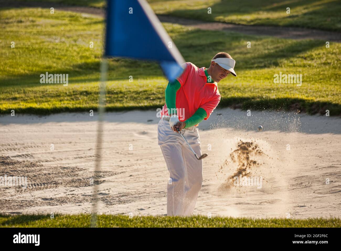 Boy playing golf red ball hi-res stock photography and images - Alamy