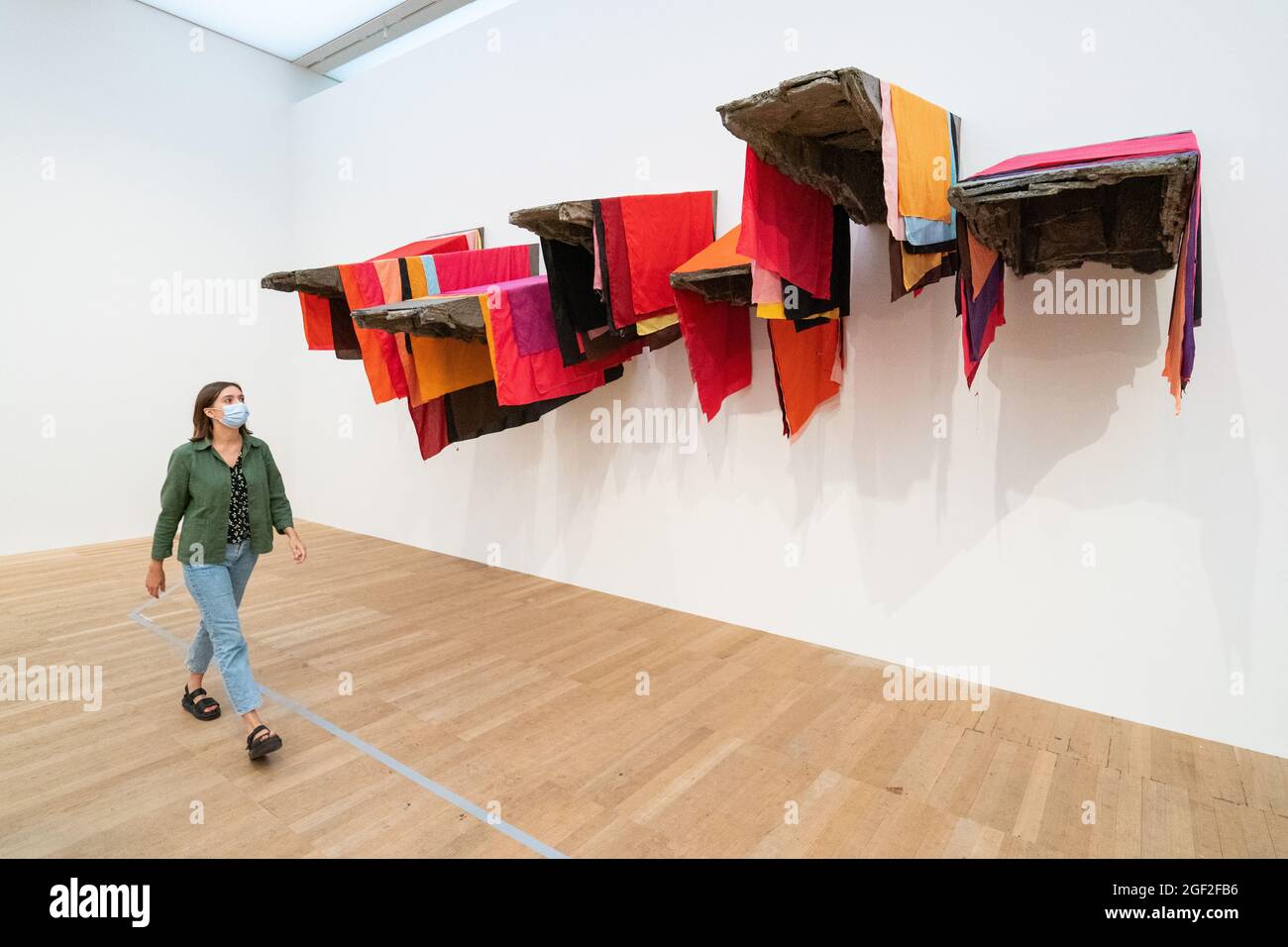 A member of Tate Modern staff views 'untitled: awnings' during a ...