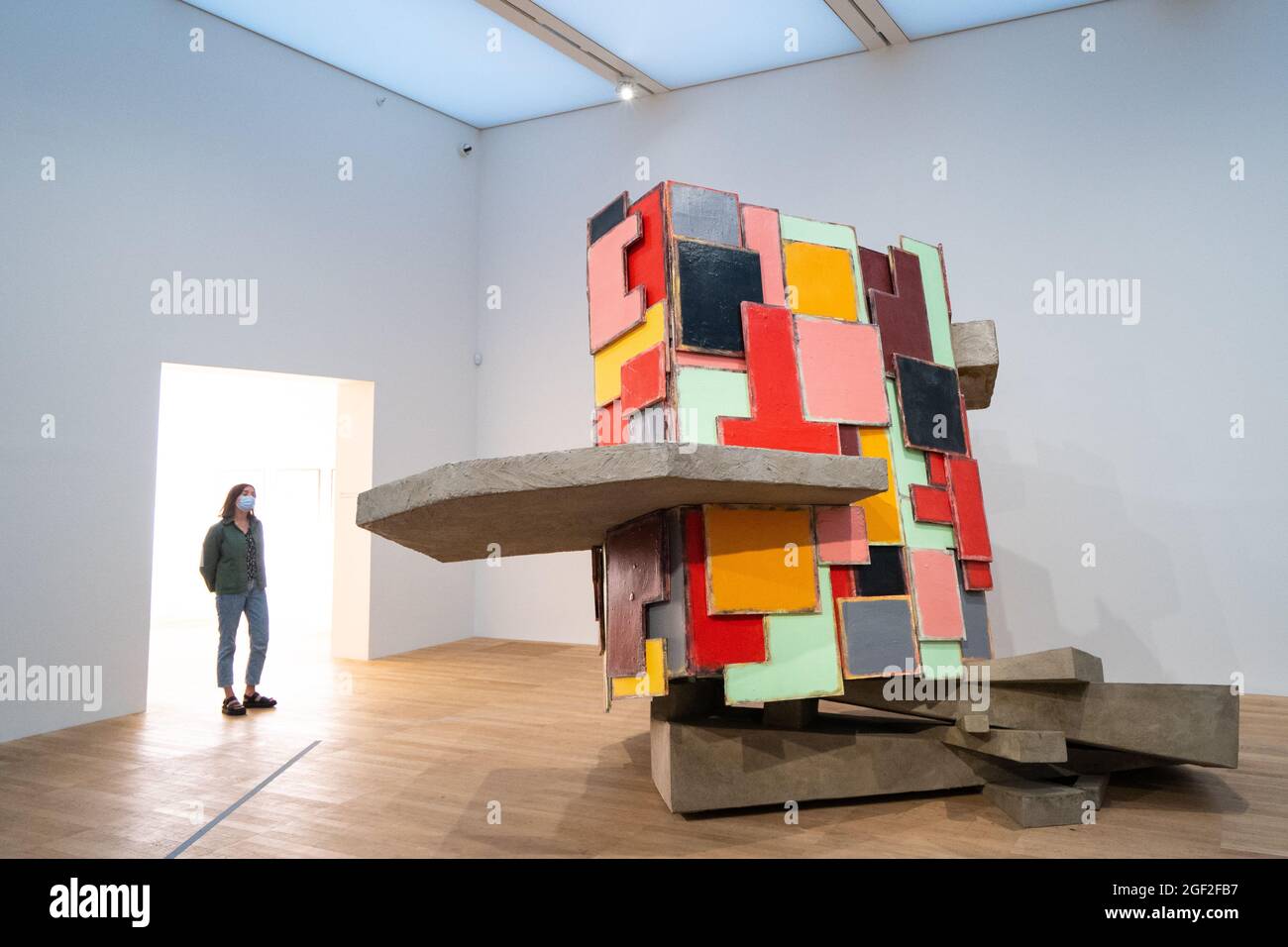 A member of Tate Modern staff views 'untitled: upturnedhouse2' during a ...