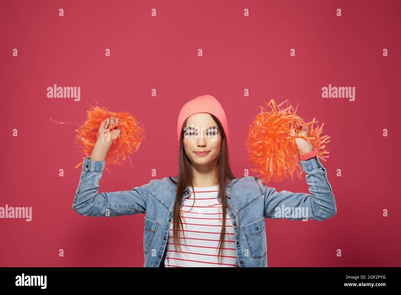 cute brunette wearing pink hat cheerleading dance victory Stock Photo ...