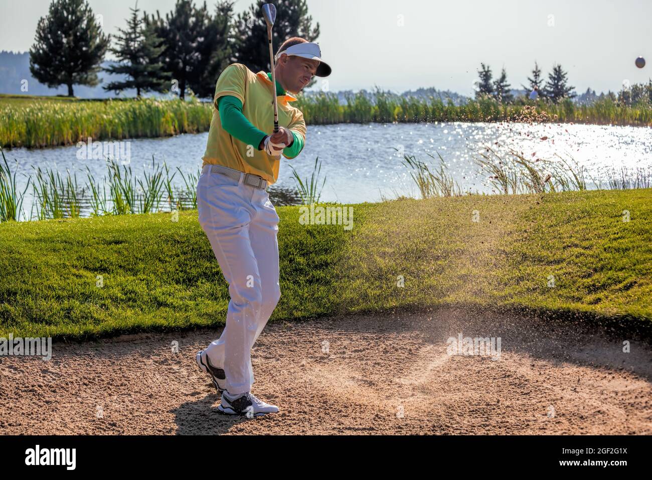 Boy playing golf red ball hi-res stock photography and images - Alamy