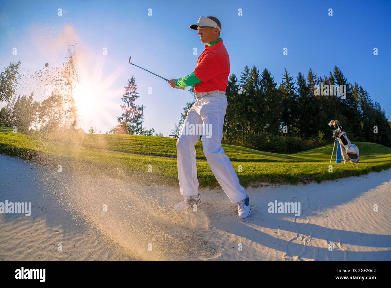 Boy playing golf red ball hi-res stock photography and images - Alamy