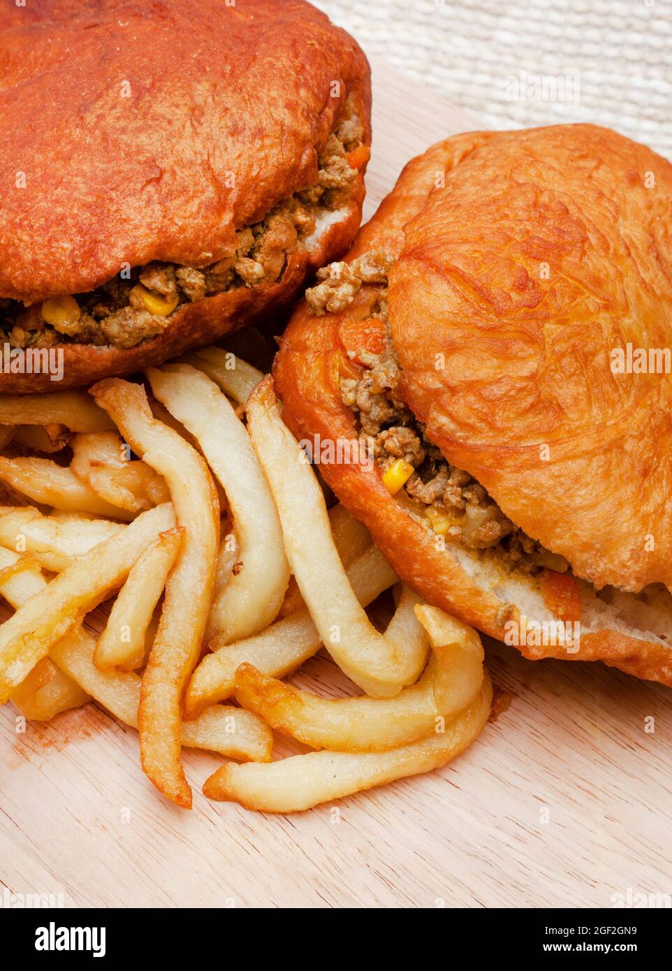 Traditional South African Vetkoek and mince Stock Photo - Alamy