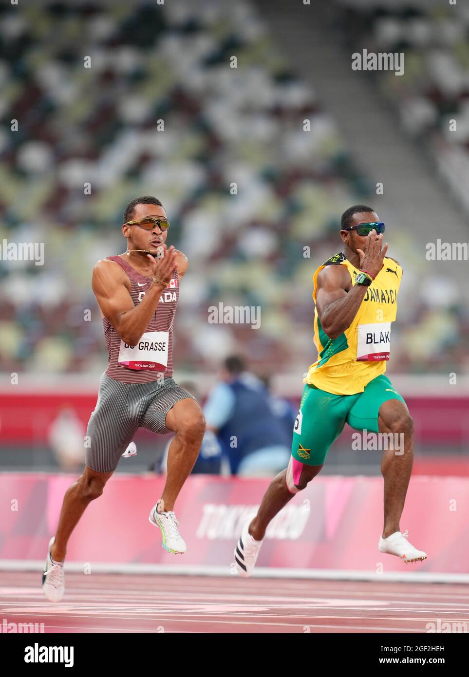 Andre De Grasse running the 100 meters at the 2020 Tokyo Olympics Stock ...
