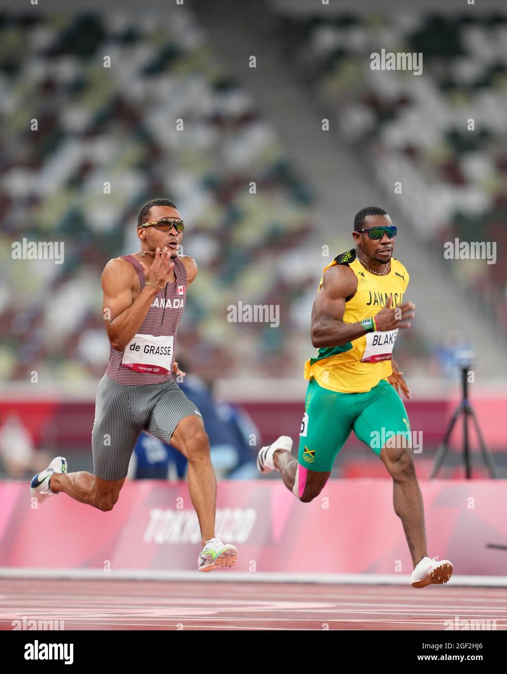 Andre De Grasse running the 100 meters at the 2020 Tokyo Olympics Stock ...