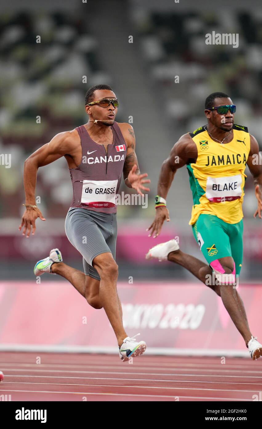 Andre De Grasse running the 100 meters at the 2020 Tokyo Olympics Stock ...