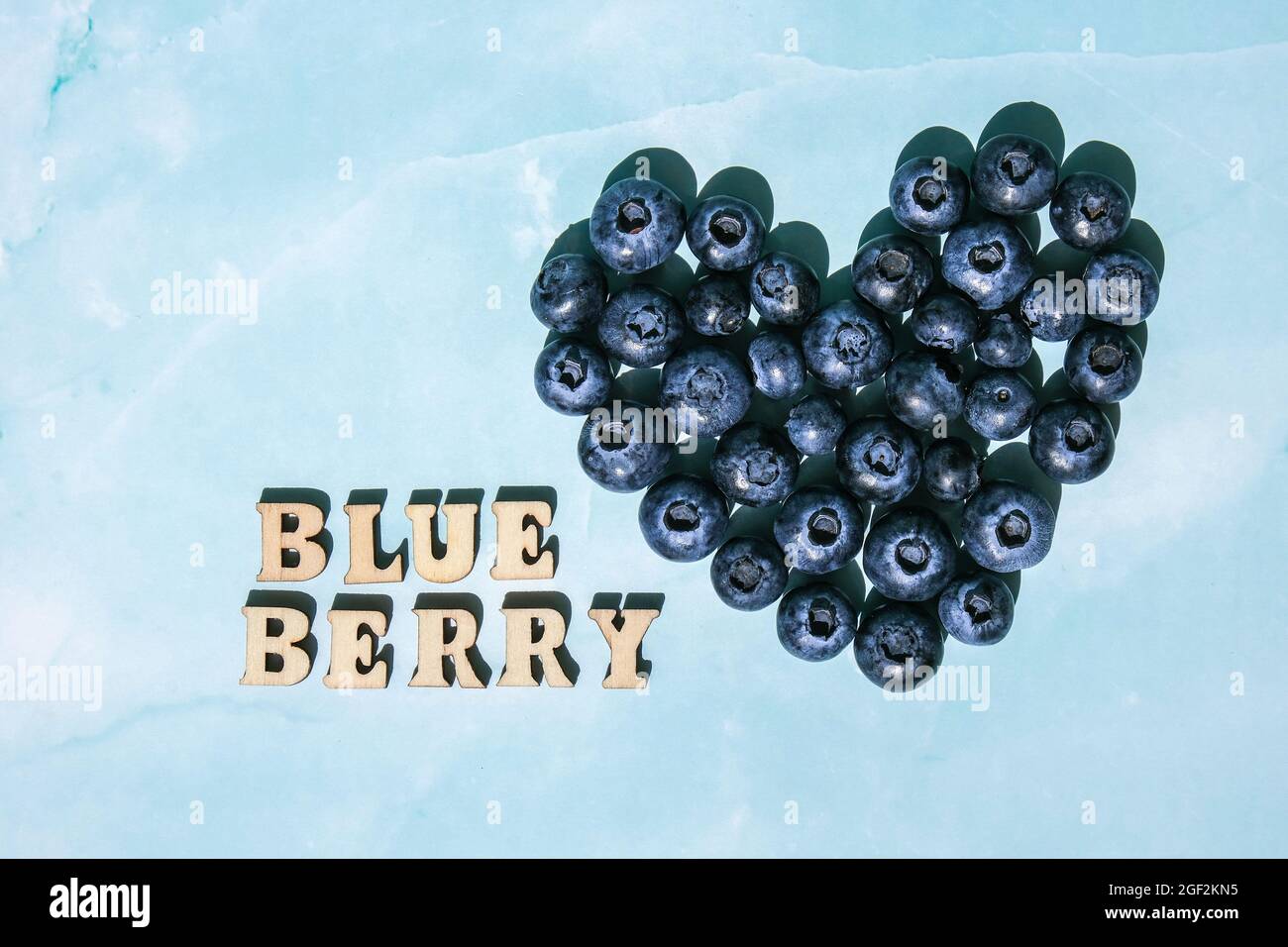 Heart made of Fresh blueberries and BLUEBERRY text. Blueberry ...