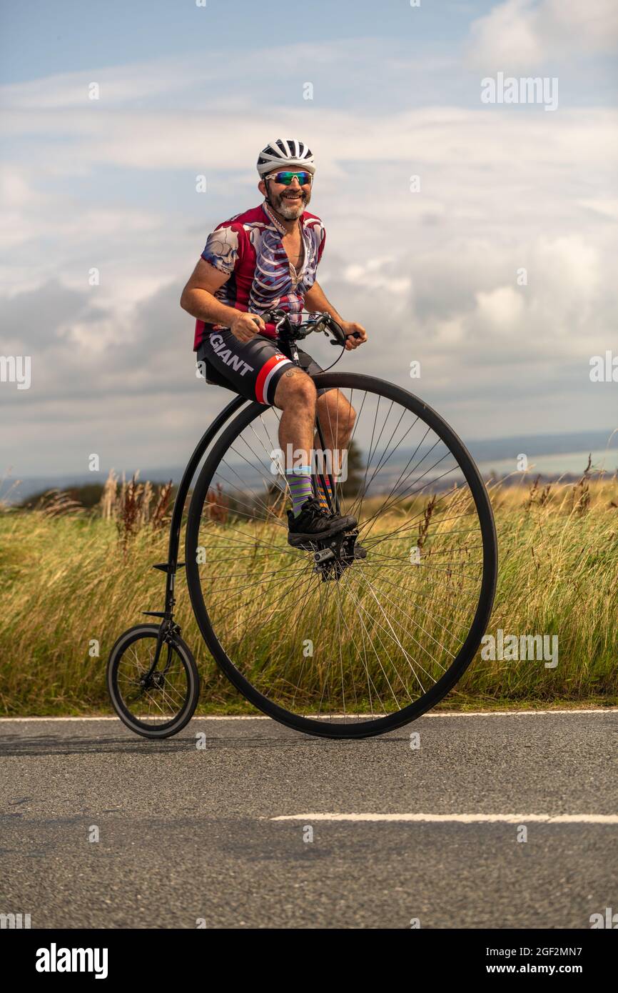A cyclist races up to Beachy Head from Eastbourne for the Beachy Head ...