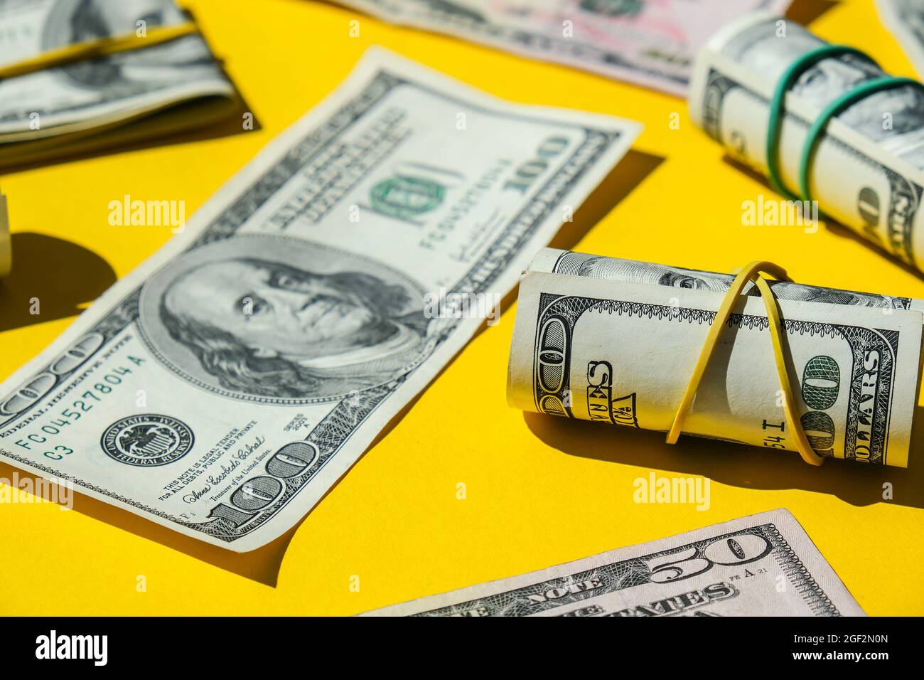 US dollars bundle close up isolated on dollar background. Paper ...