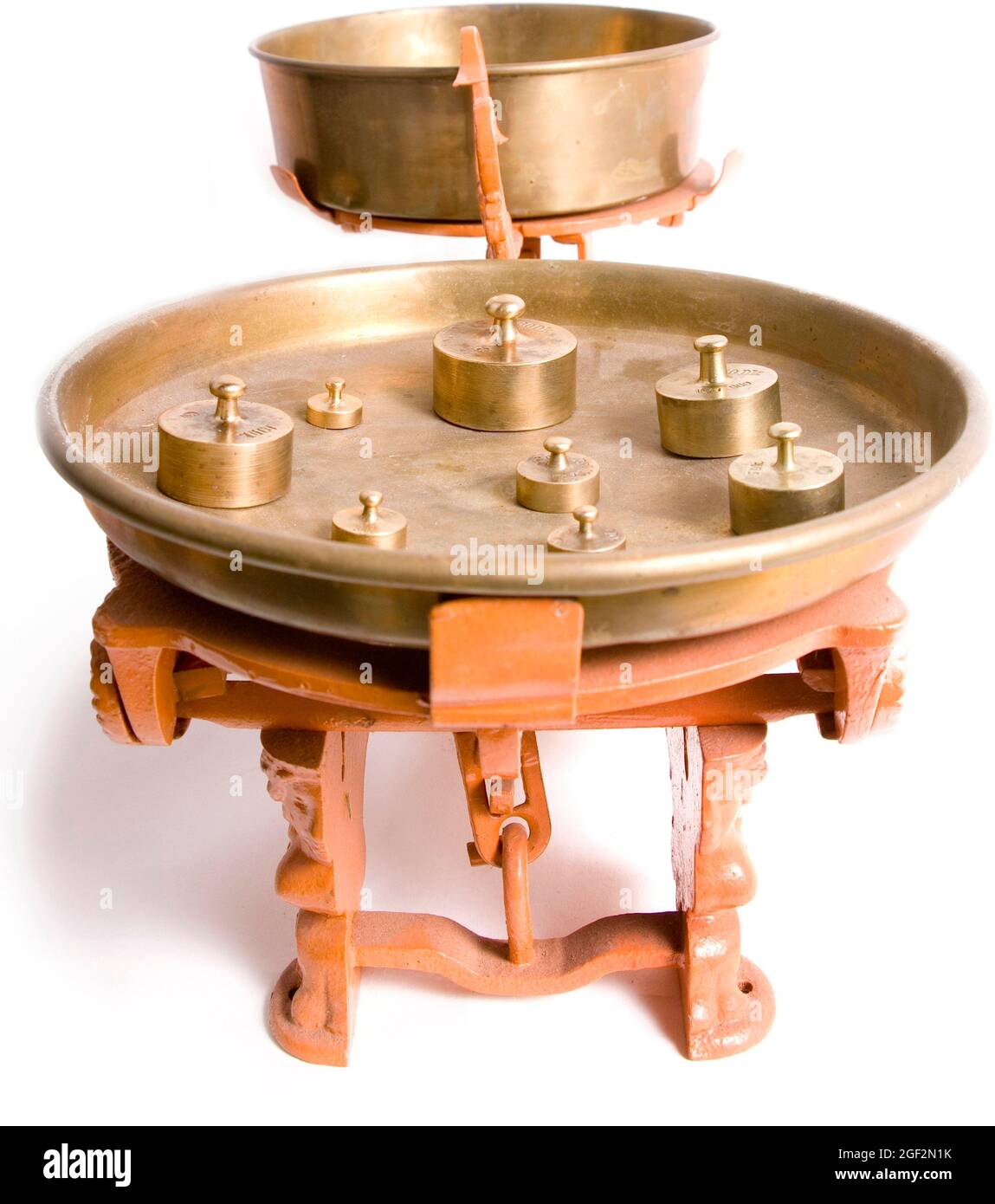 old scale made of copper with weights, cutout Stock Photo - Alamy