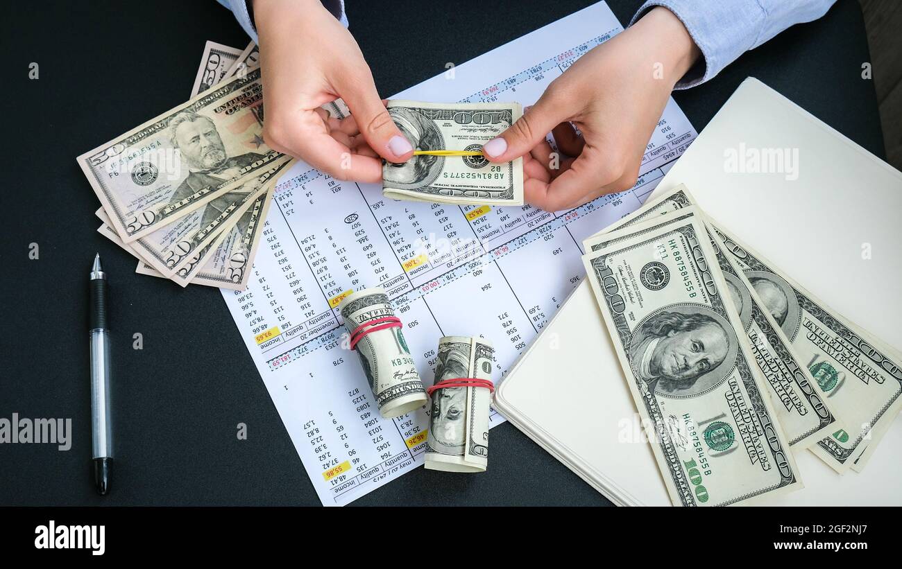 Business woman displaying spread cash hi-res stock photography and ...