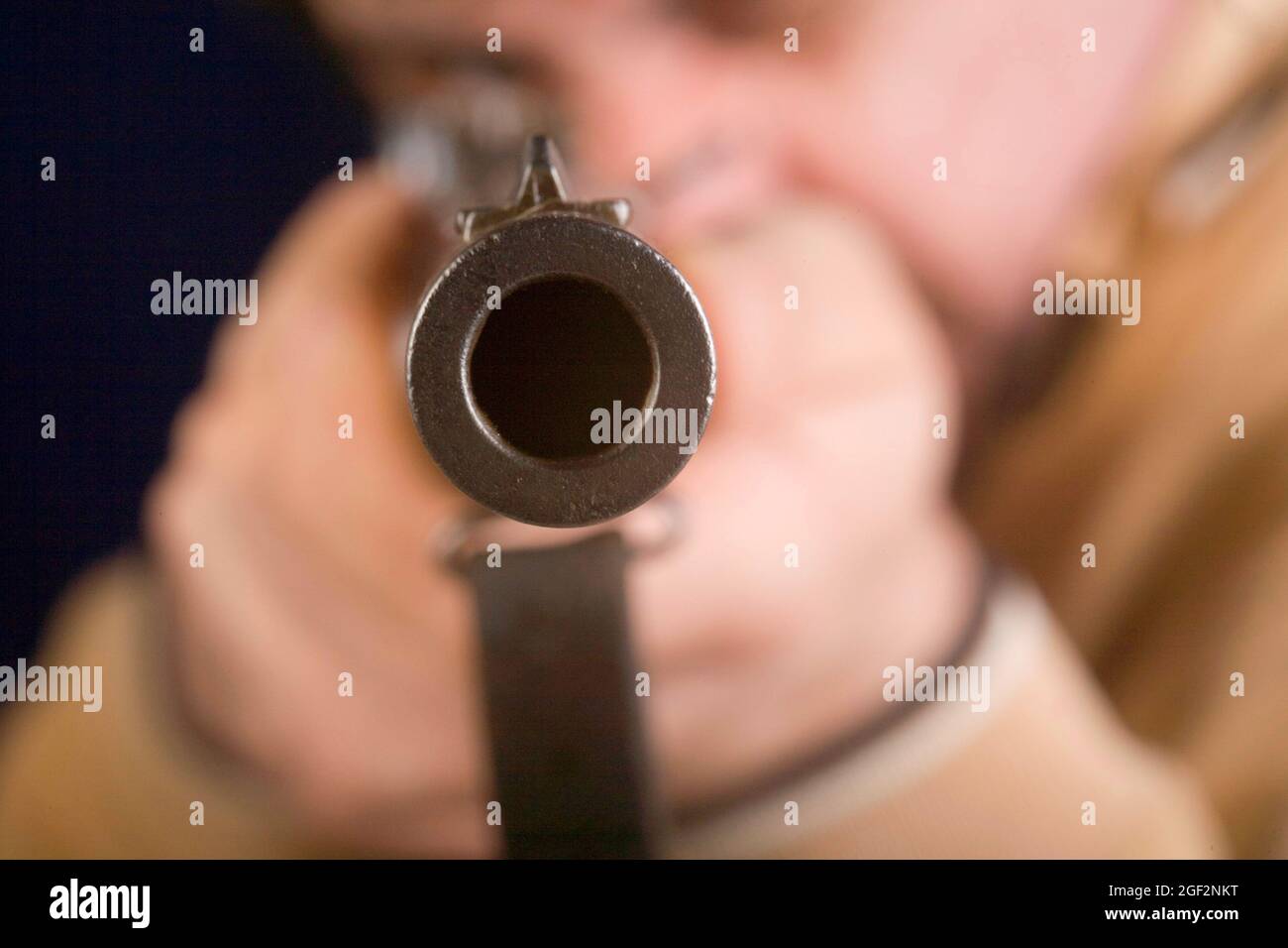Man holding gun hi-res stock photography and images - Alamy