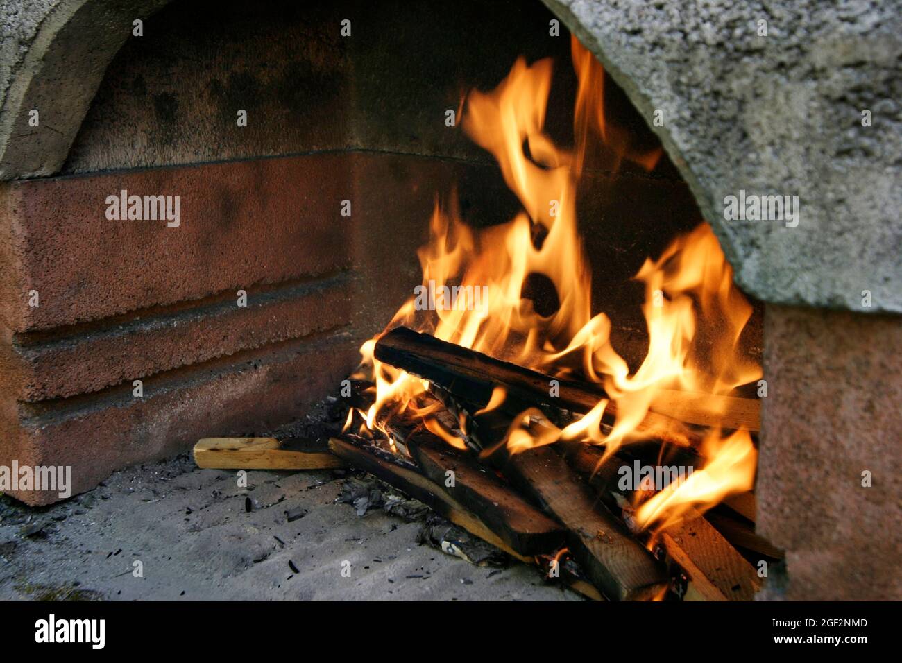 fire in a barbecue chimney Stock Photo - Alamy