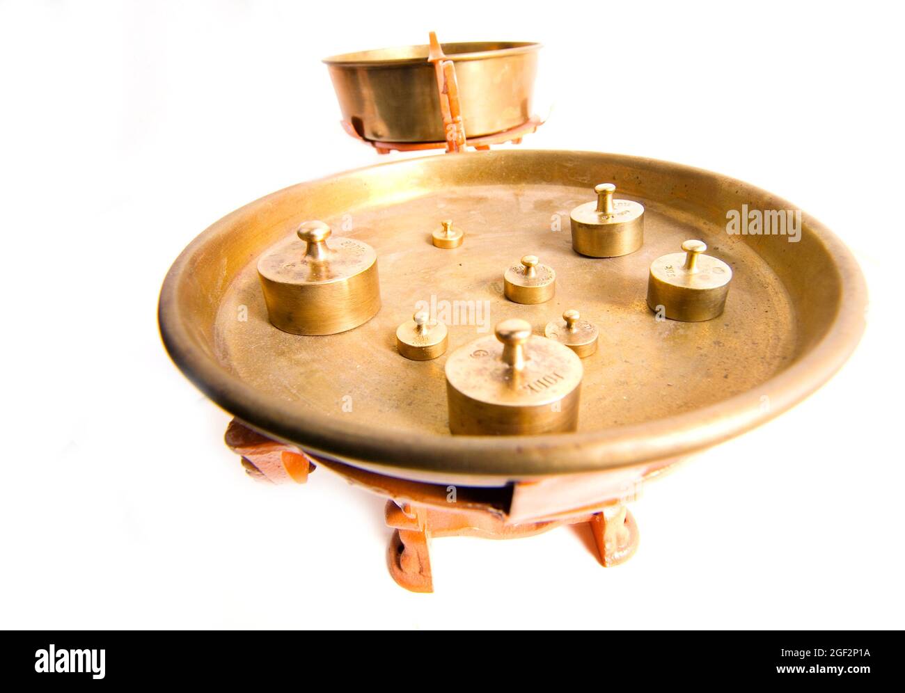 old scale made of copper with weights, cutout Stock Photo - Alamy