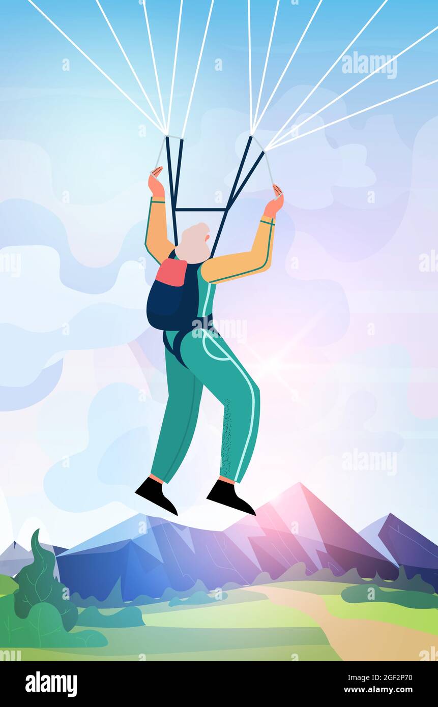 senior woman flying down during skydiving jump aged skydiver floating ...