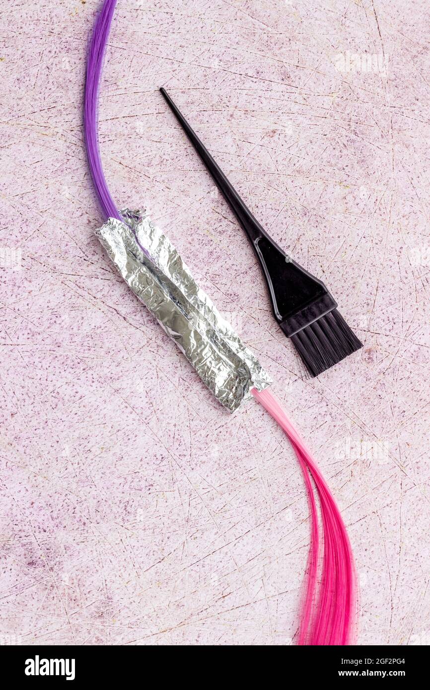 Brush strand coloring hair hi-res stock photography and images - Alamy