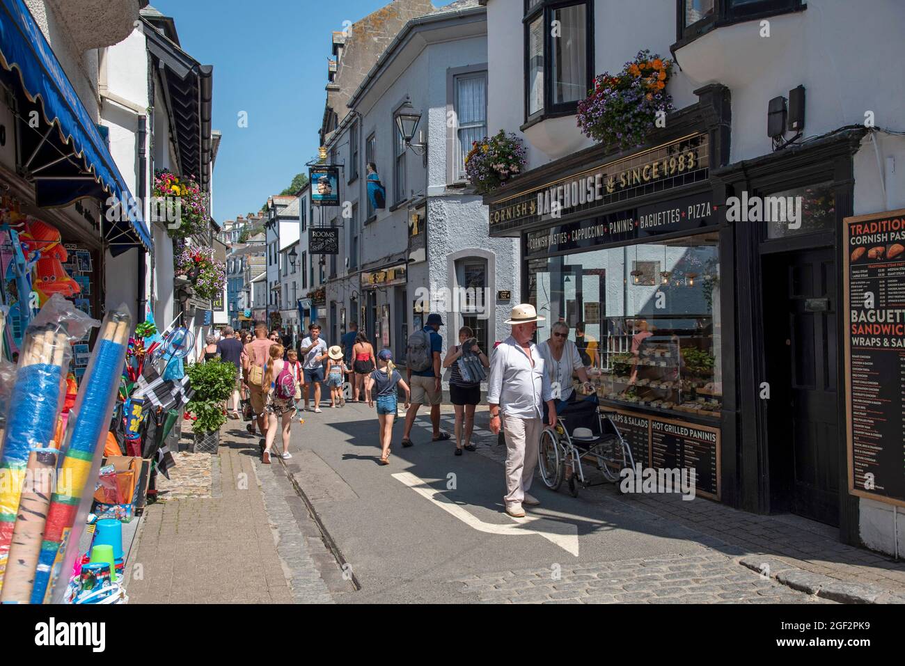 Looe, Cornwall, England, UK. 2021. Holidaymakers mingle along Fore ...