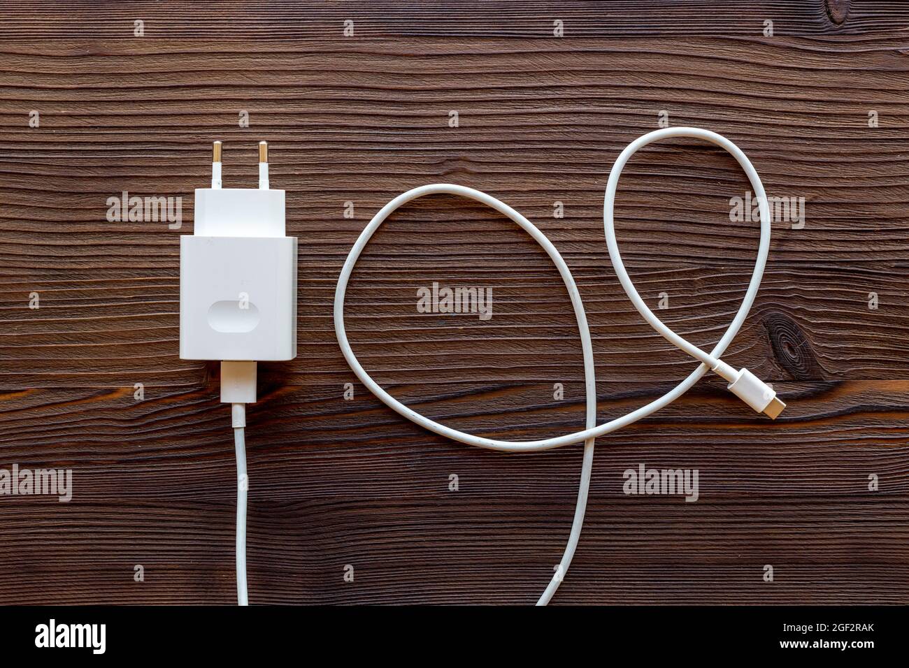 Charging cable for mobile phone or laptop, top view Stock Photo - Alamy