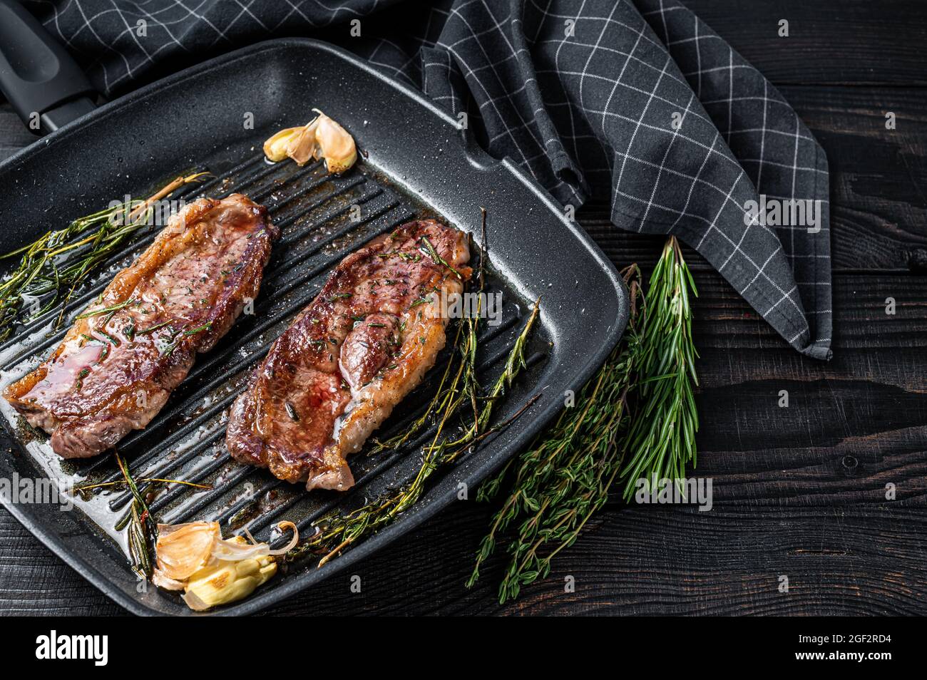 Grilled Prime Black Angus beef steaks Striploin or New York in a grill ...