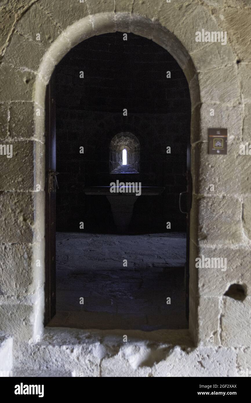 Vertical shot of an arc window in the fortress Stock Photo - Alamy