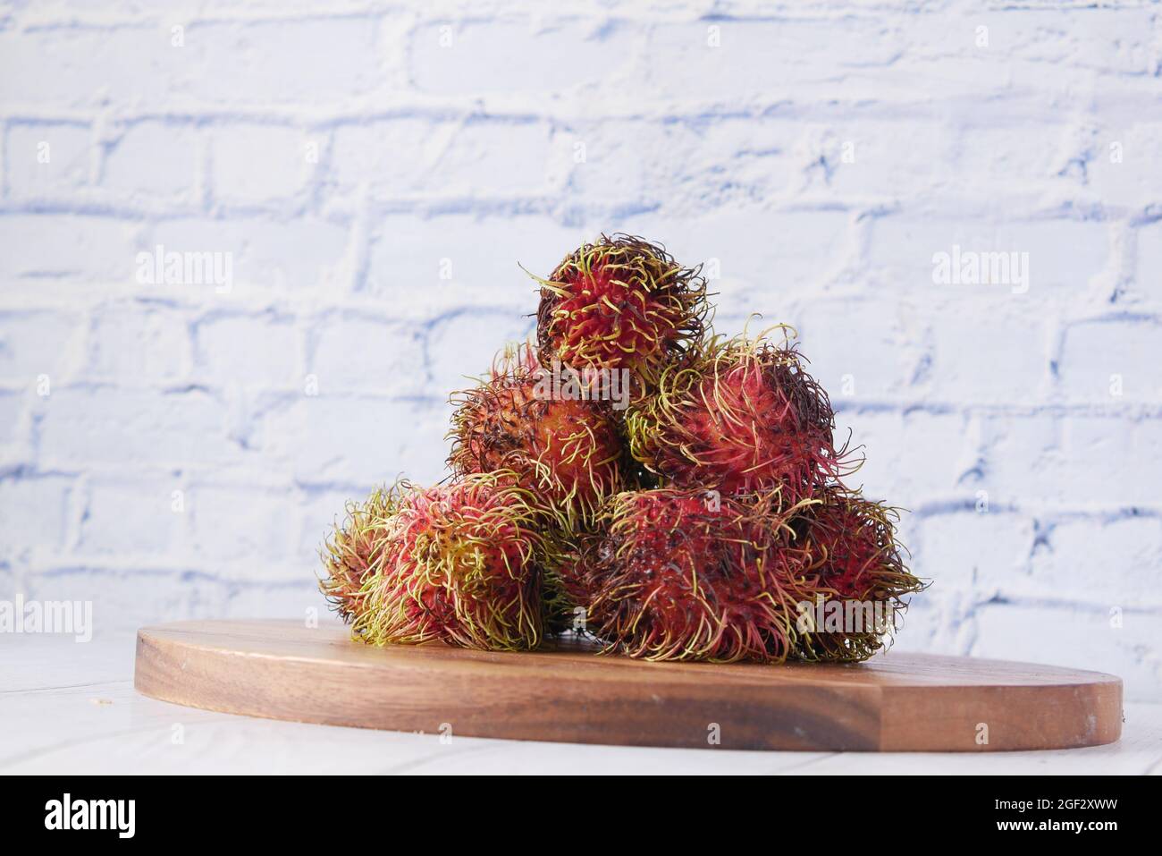 Stack rambutan in chopping board hi-res stock photography and images ...