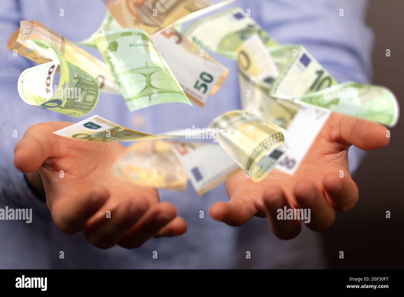 Person holding a 3D render of floating euro banknotes Stock Photo - Alamy