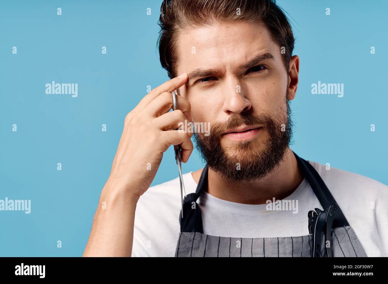 male hairdresser scissors comb provision of services Stock Photo - Alamy
