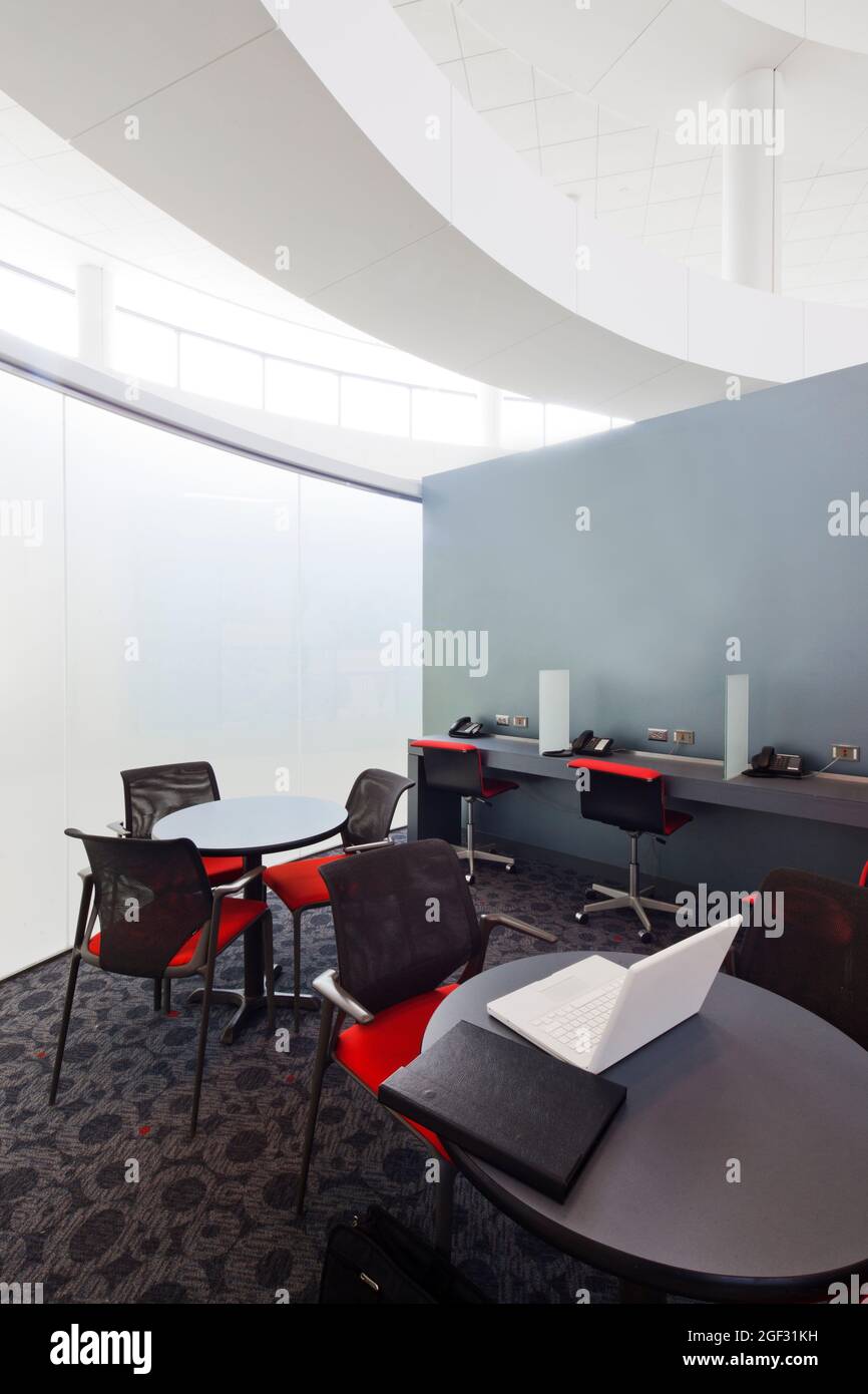 A business centre, tables and chairs, laptops and telephones Stock ...