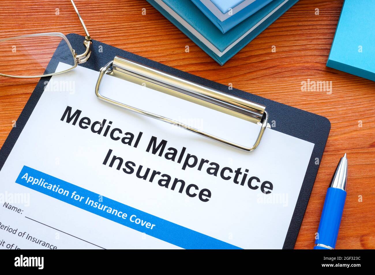 Medical malpractice insurance application and clipboard Stock Photo - Alamy