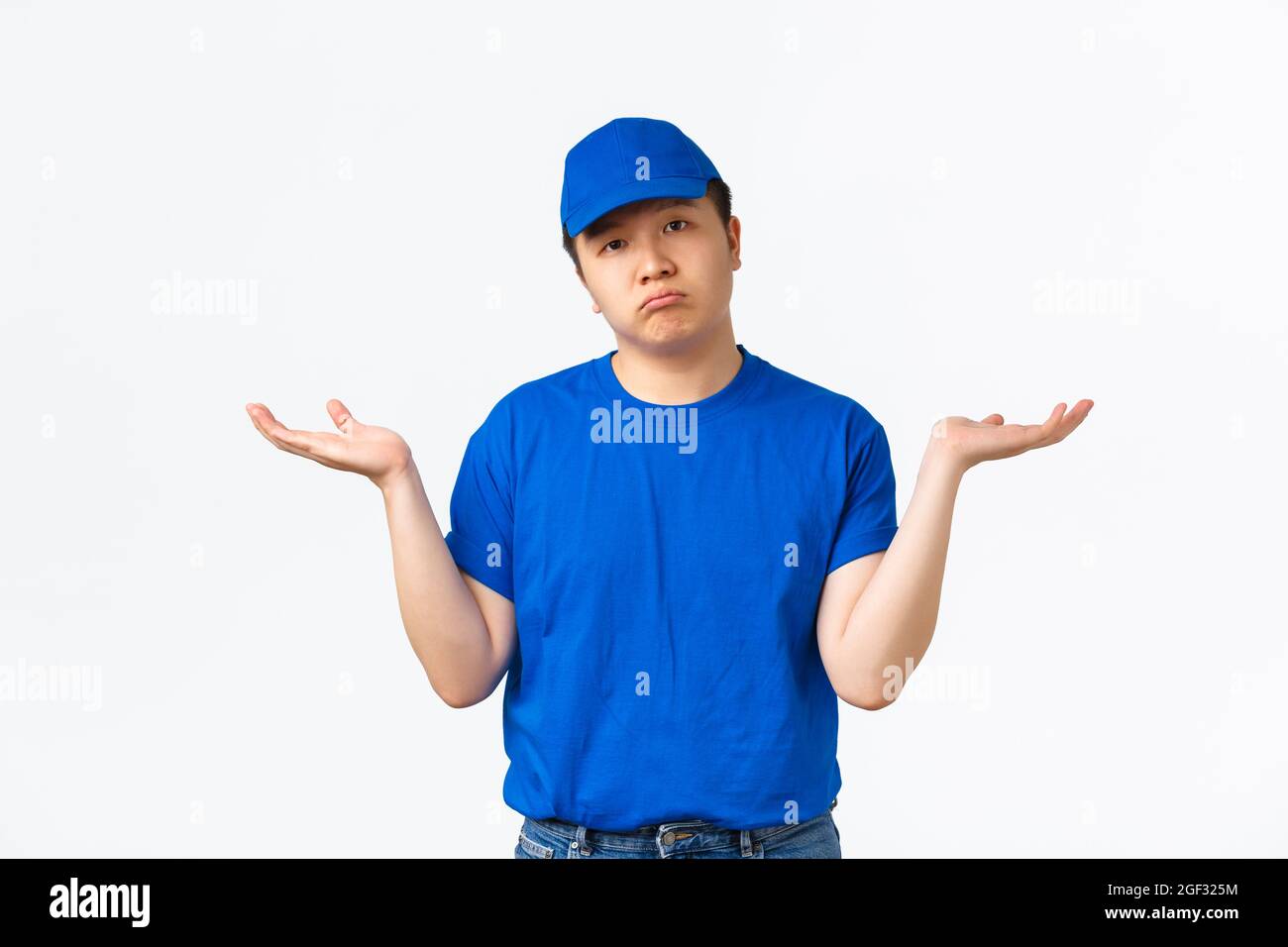 Man shrugging uniform hi-res stock photography and images - Alamy