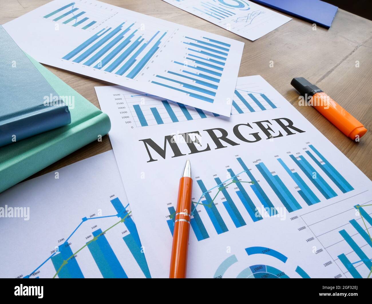 The company merger plan with business charts Stock Photo - Alamy