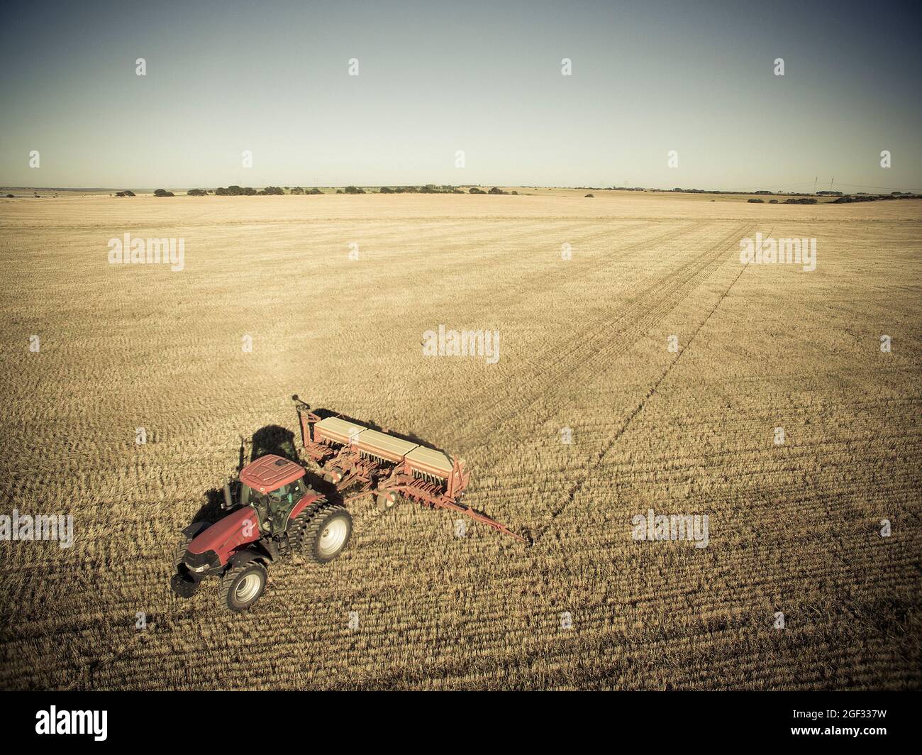 Aerial view of a tractor in direct sowing, in the Argentine field, La ...