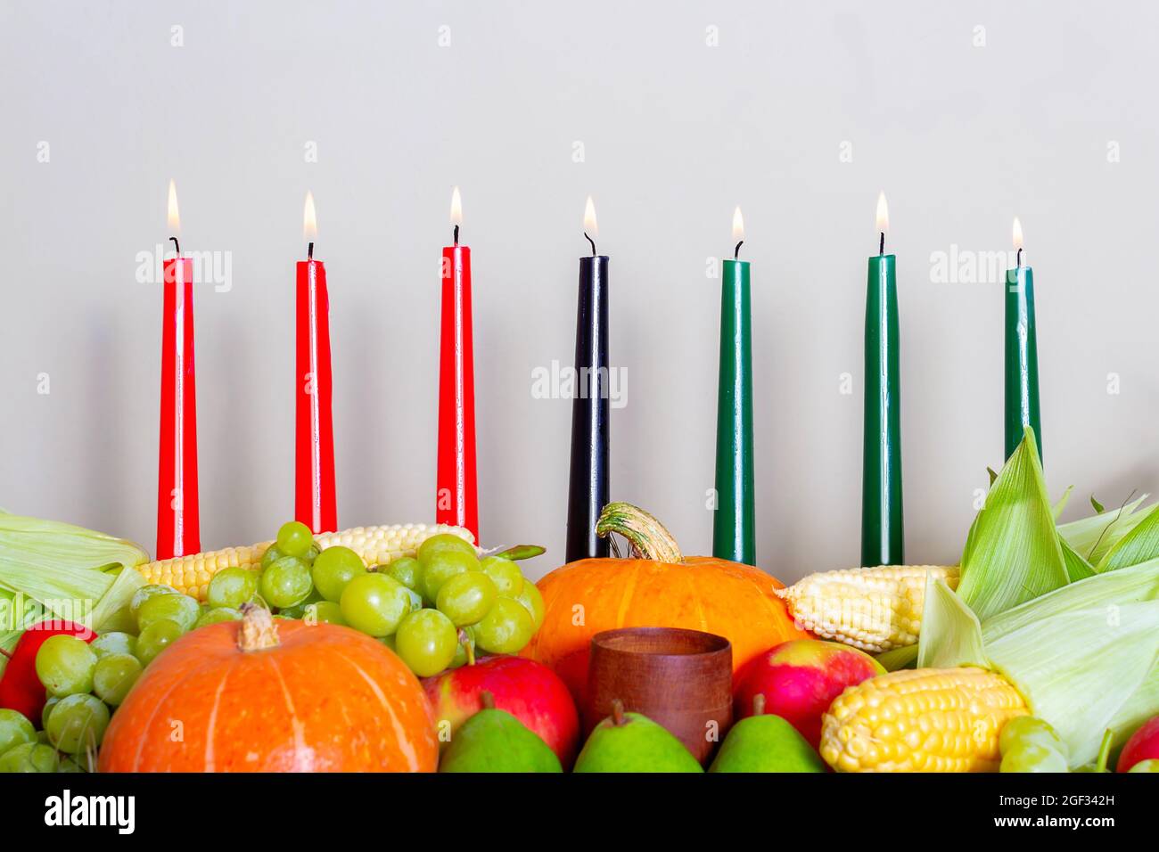 Kwanzaa Afro-American holiday. Corn, bowl and harvest Stock Photo - Alamy