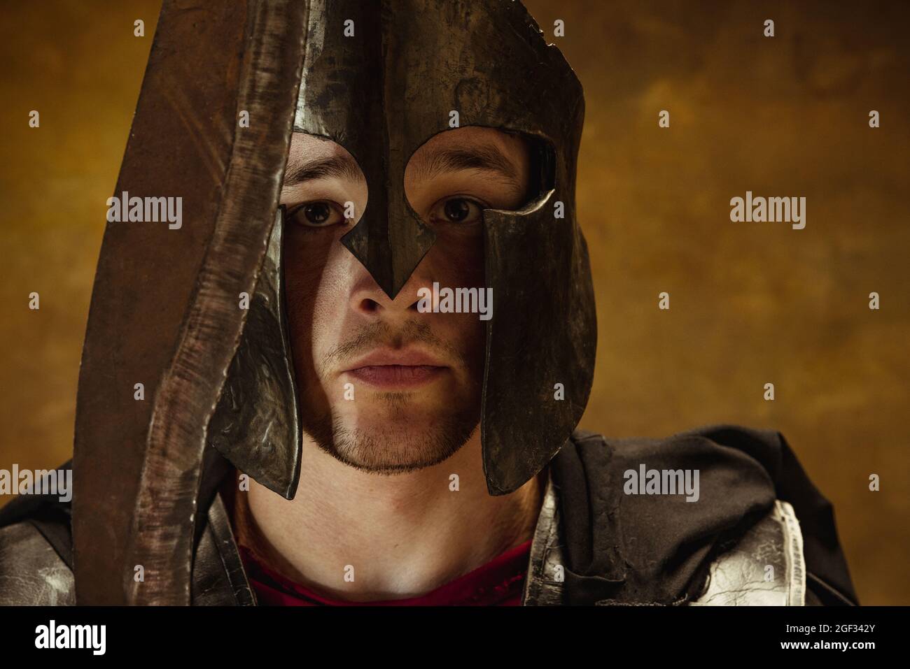 Close up of face of medieval person, brutal man, warrior or knight in ...