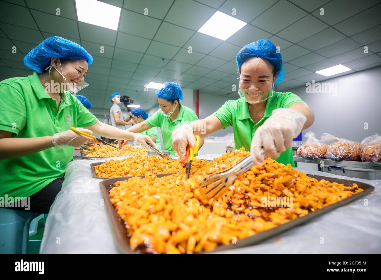 BIJIE, CHINA - AUGUST 23, 2021 - Workers rush to make orders for ...