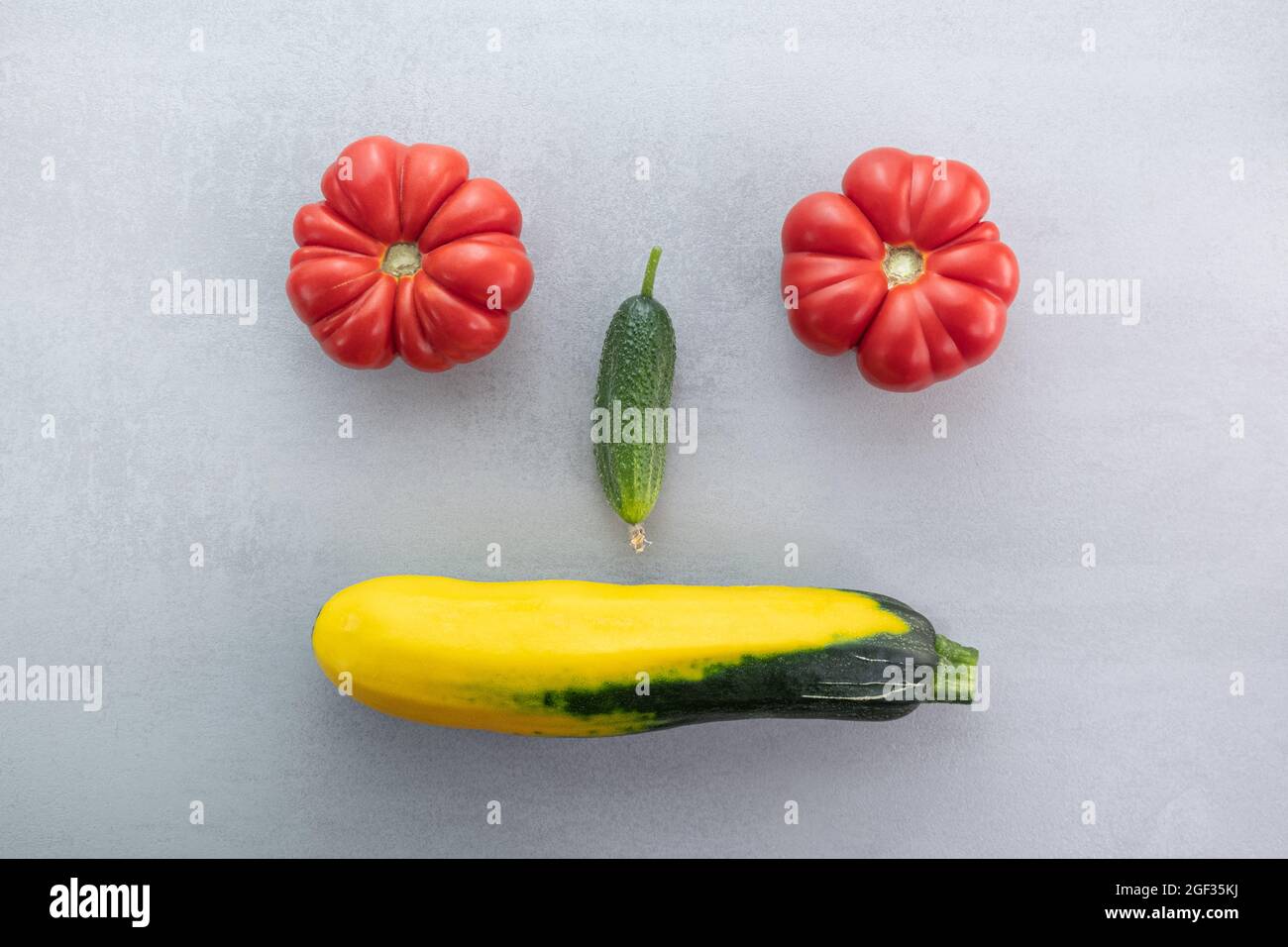 Funny Face Shape formed by Vegetable products: Tomatoes, cucumber ...