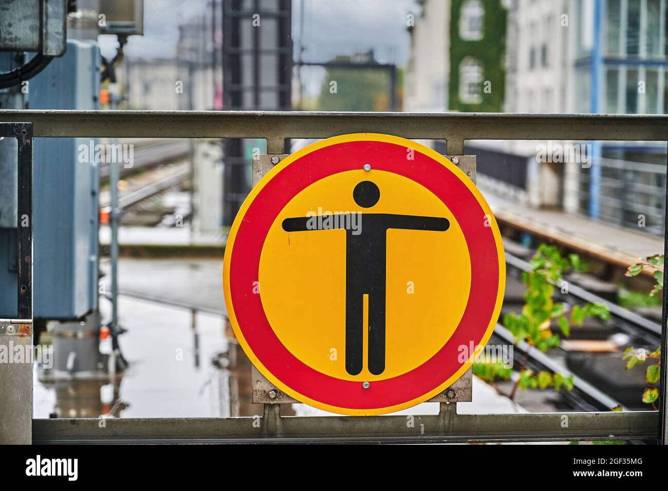Warning sign on a railroad platform indicating that unauthorized ...