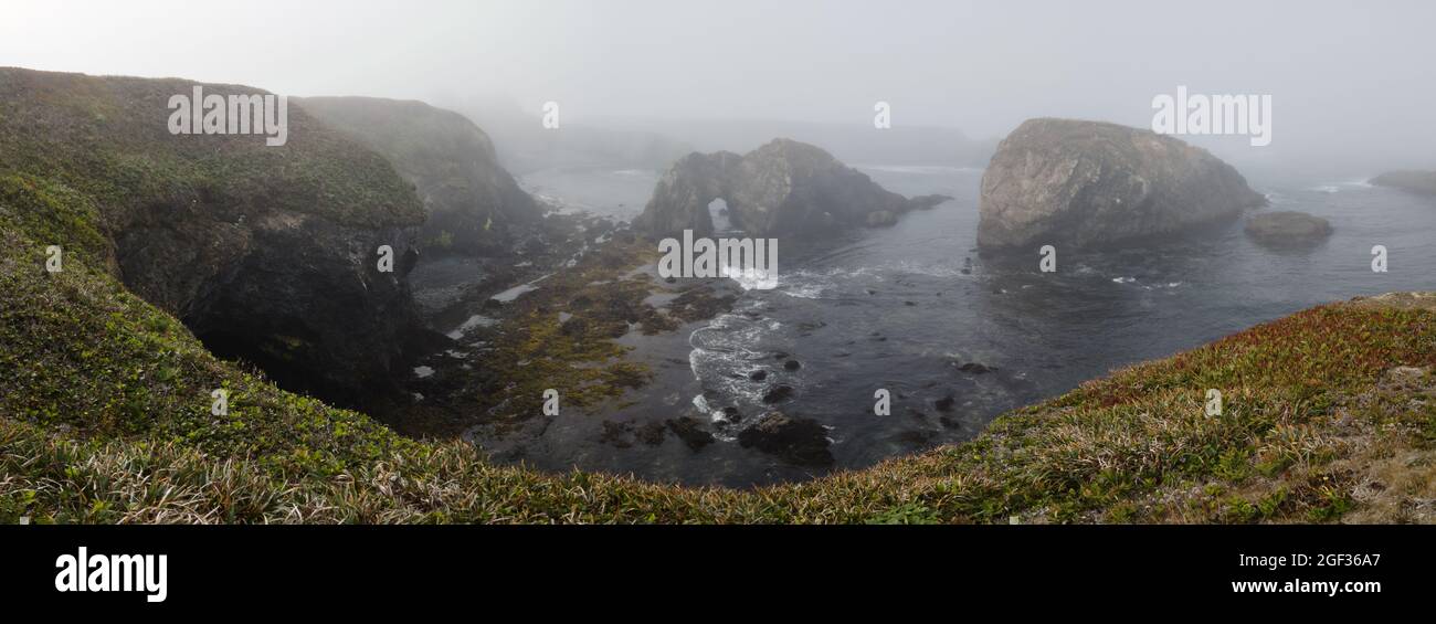 Cold water from the Pacific Ocean washes against the rugged and scenic ...