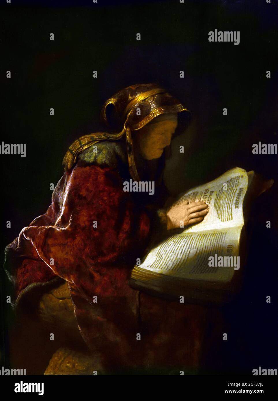 An Old Woman Reading, Probably the Prophetess Hannah 1731 by Rembrandt ...