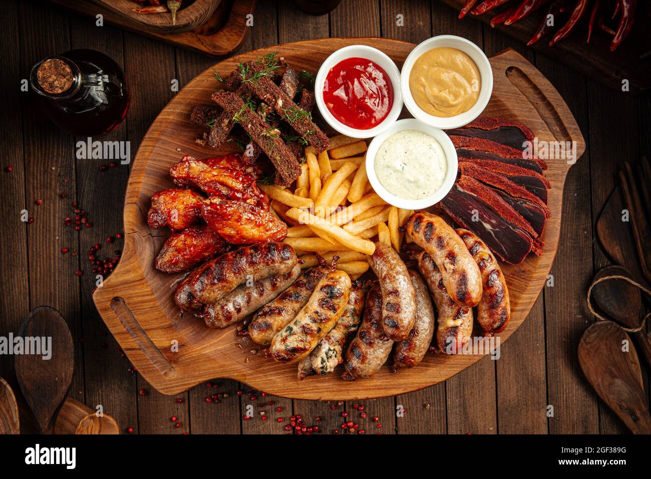 Wooden tray of beer appetizers set assortment Stock Photo - Alamy