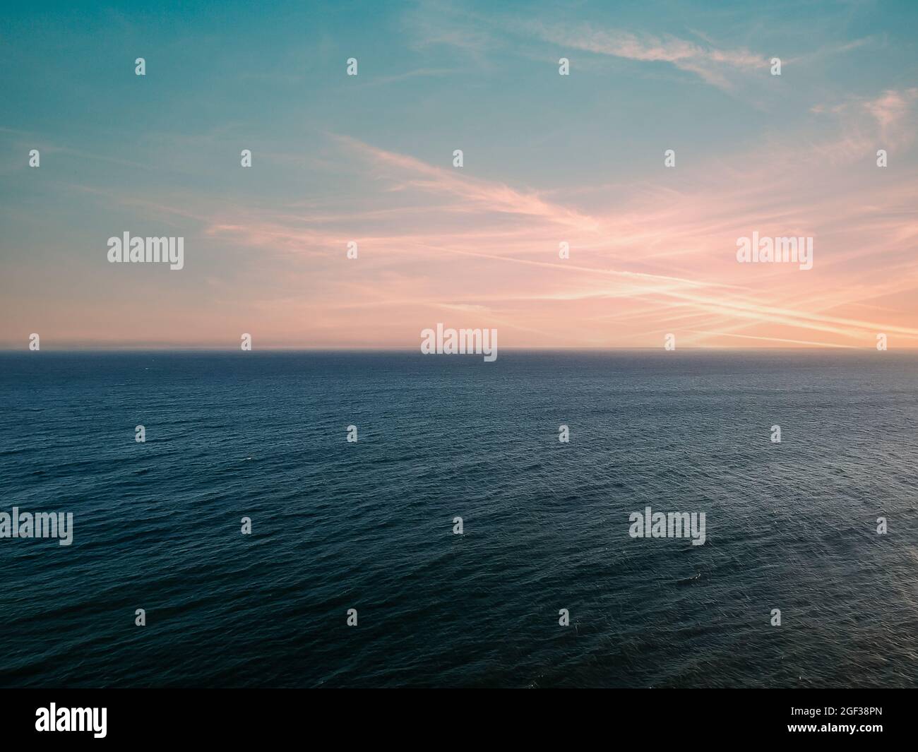 Aerial view of Barra da Tijuca ocean during sunset, golden light Stock ...